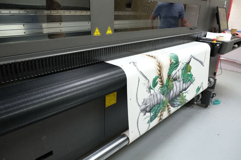 Pros and Cons of buying a printer for vehicle wrapping